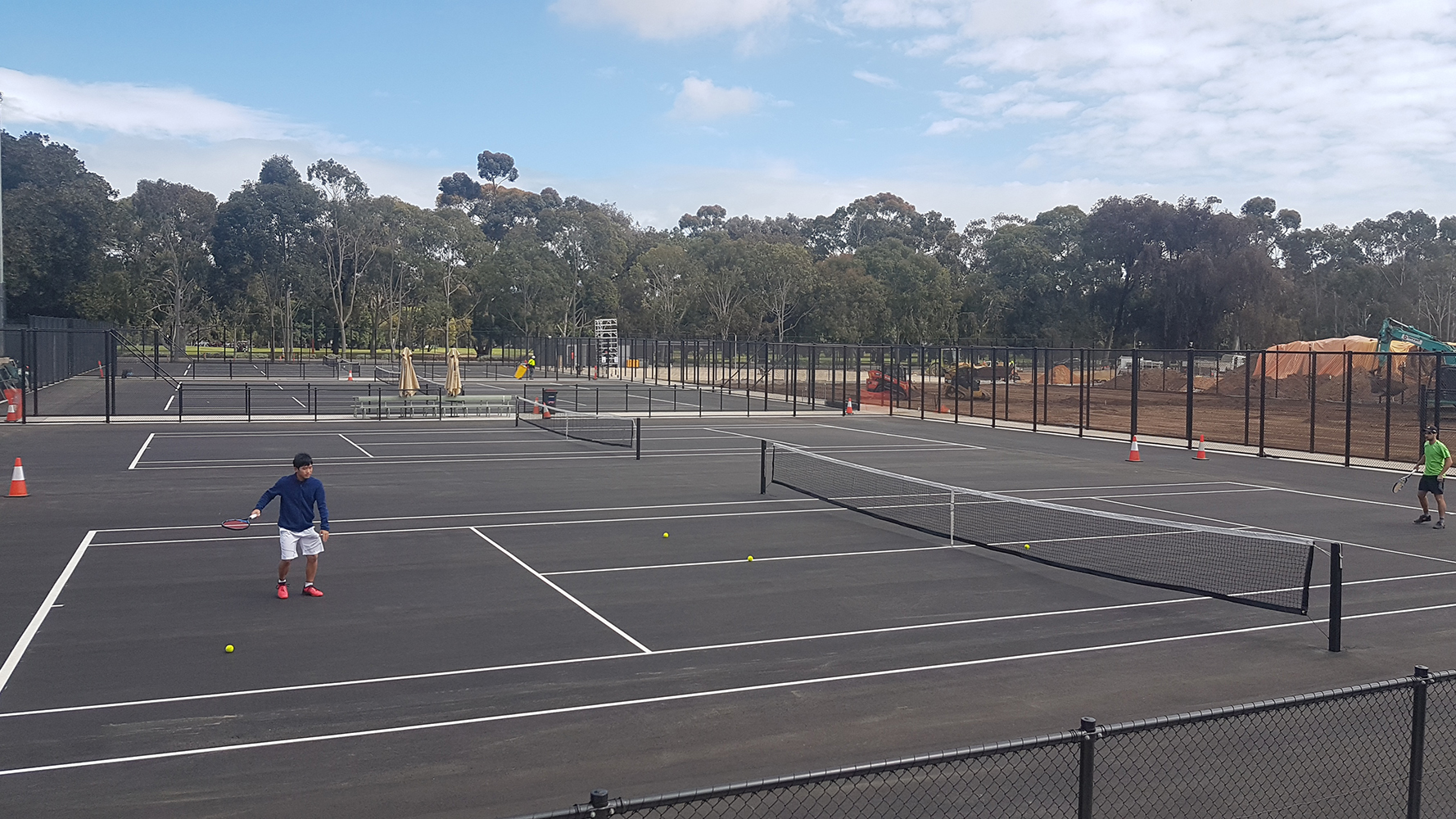 What pavement base should I construct for my acrylic hard court?